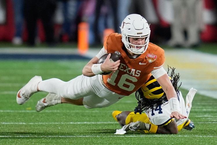 Arch Manning runs and passes Texas past Michigan in Citrus Bowl