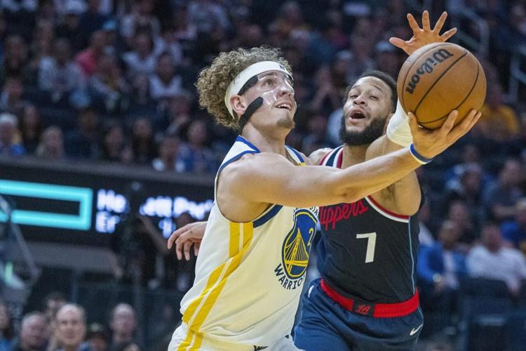 Clippers hold off Warriors as Stephen Curry goes down injured