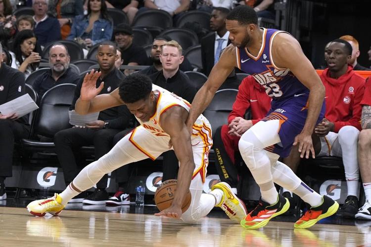 Devin Booker scores 30 points, Suns get hot from 3-point range to beat Hawks 128-115