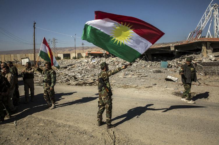 Iraqi Kurdish fighters take back Sinjar from the Islamic State