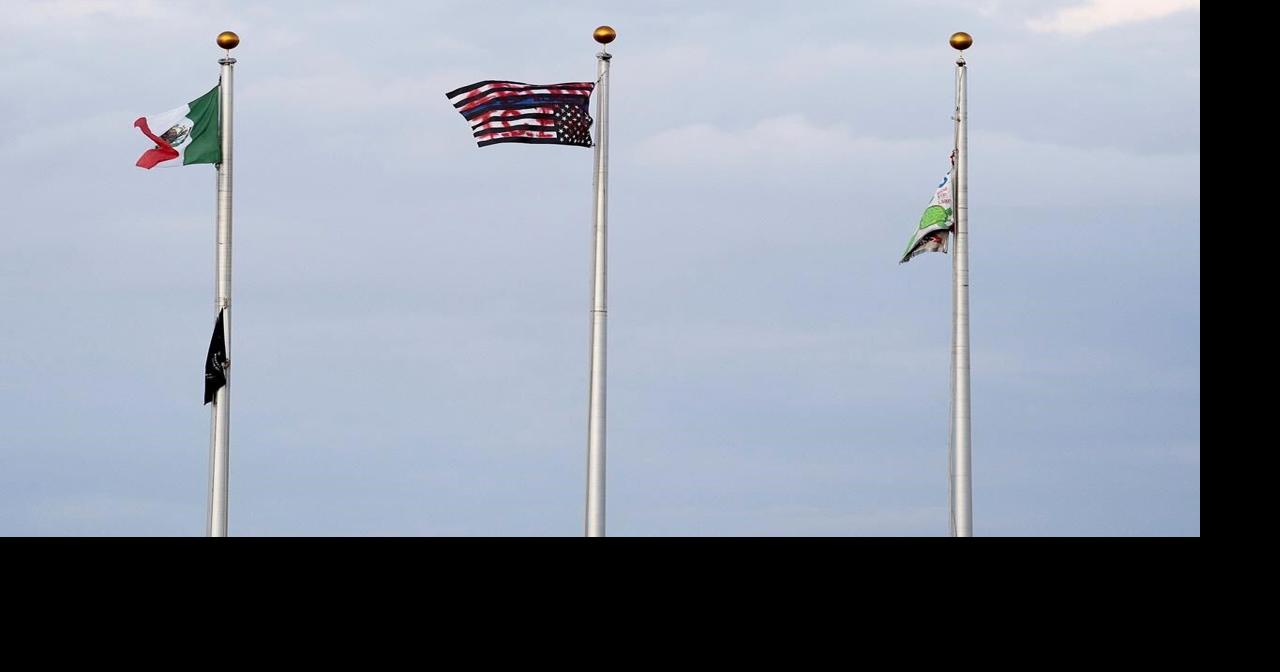 Police investigate after US flag removed during protest