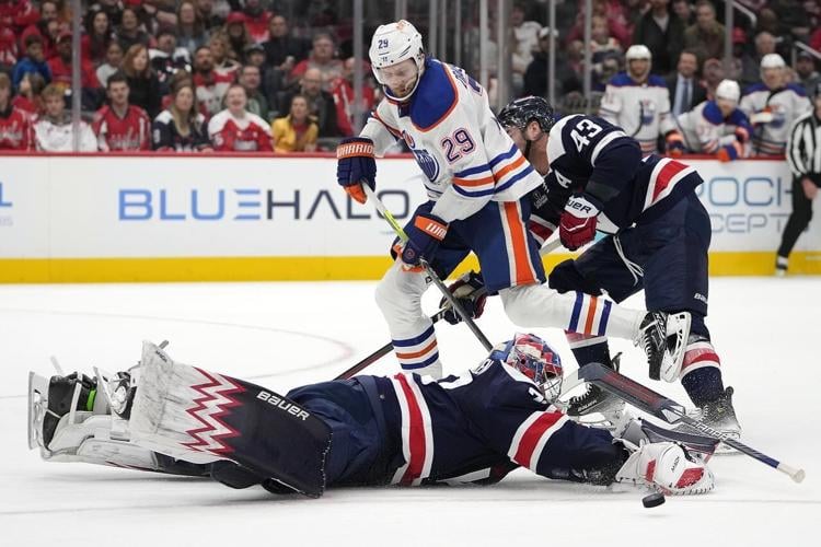 Draisaitl has 2 goals and McDavid 4 points as the Oilers end the Capitals' 5-game winning streak