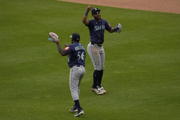 Arozarena, Mariners rally past Reds for 11-7 win in 10 innings