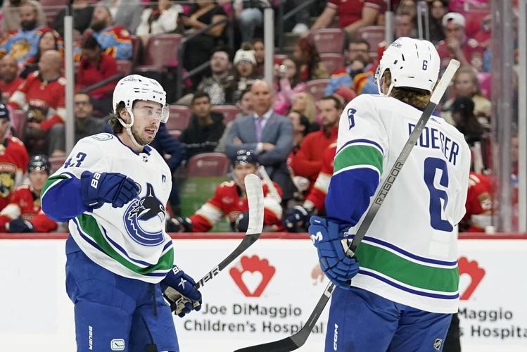 Canucks score two late goals, beat Panthers 5-3