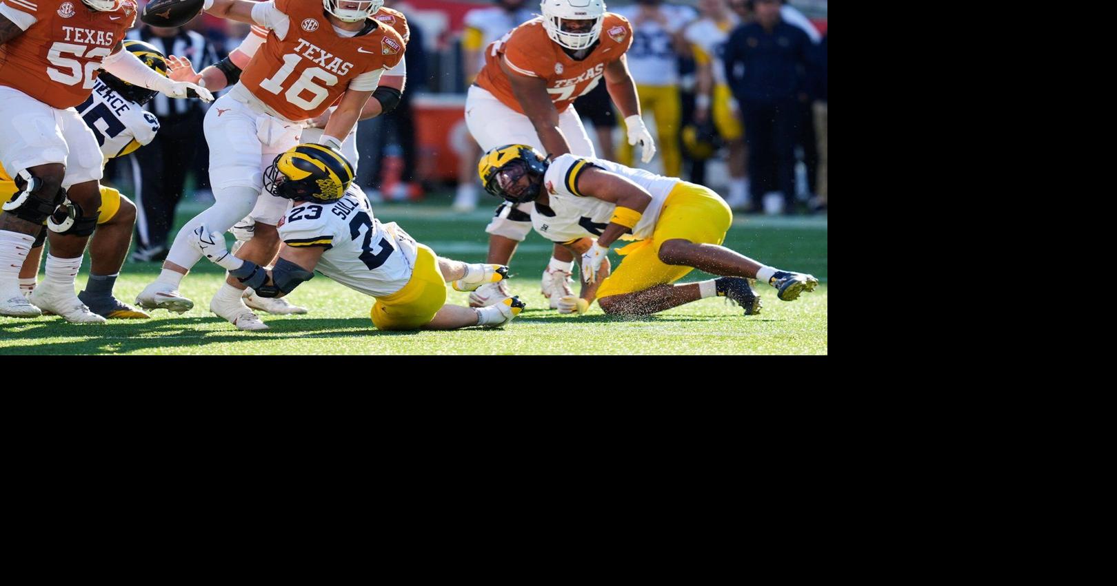 Manning uses arm and legs to lead No. 14 Texas to a 41-27 Citrus Bowl ...