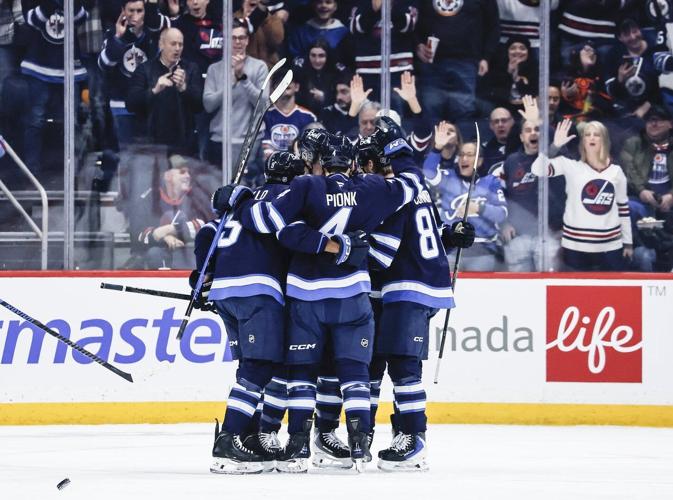 Bouchard completes Oilers rally over lowly Jets; Winnipeg's winless ...