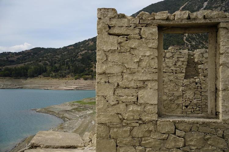 Ruins of a long-sunken Greek village emerge as drought saps a vital ...