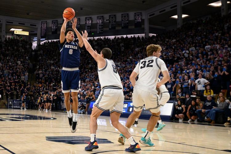 Mason Falslev scores 26 points to help No. 23 Utah State beat Nevada 71-62