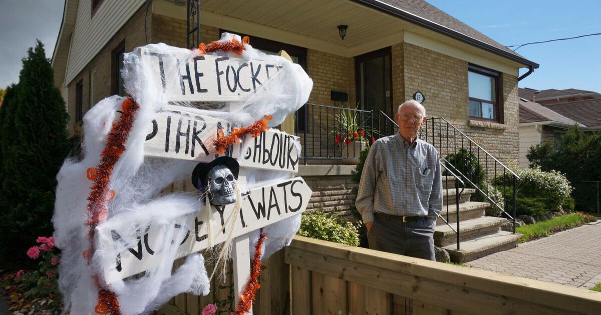 Over-the-fence fracas: Neighbours’ feud erupts over obscene sign