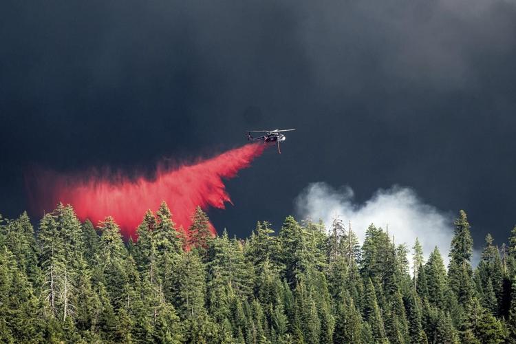 Huge California wildfire chews through timber in very hot and dry weather