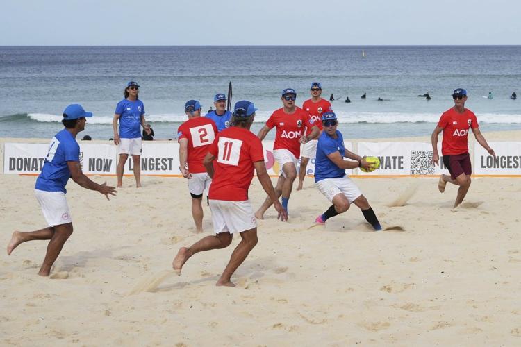 Australian friends claim world record for longest beach touch rugby game