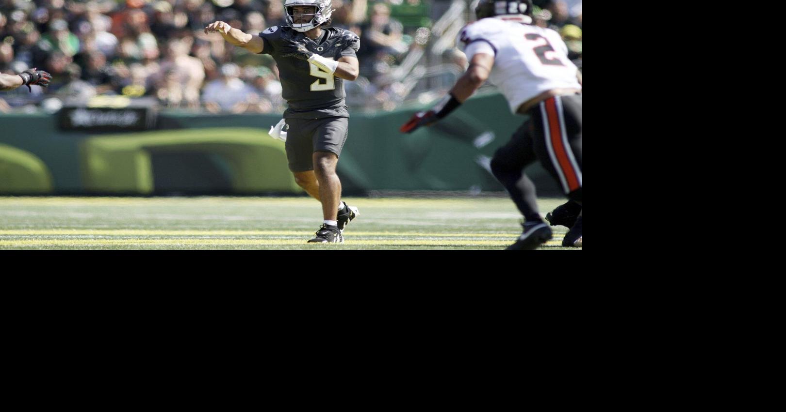 NCAA football scores: Moore throws career-best 4 TDs and No. 6 Oregon ...