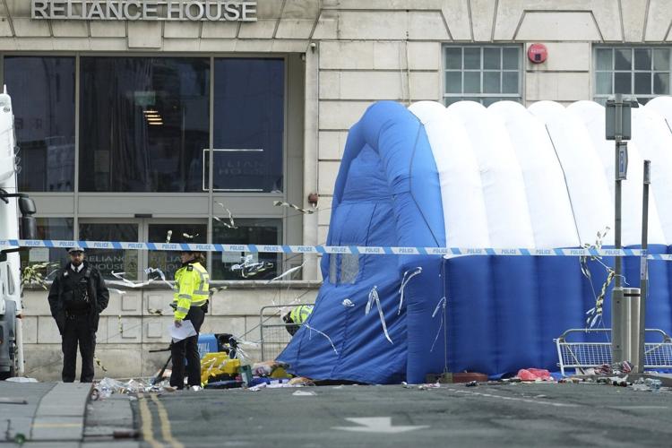 Driver arrested after Liverpool soccer parade car ramming