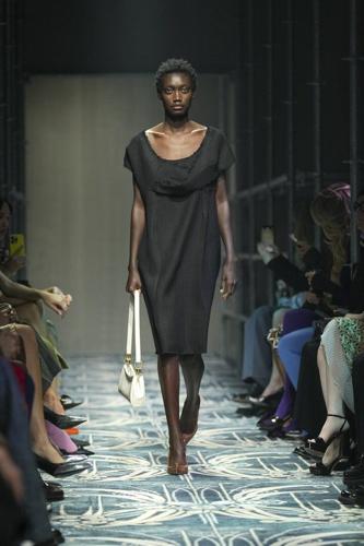 Prada reconstructs femininity starting with the little black dress fit ...