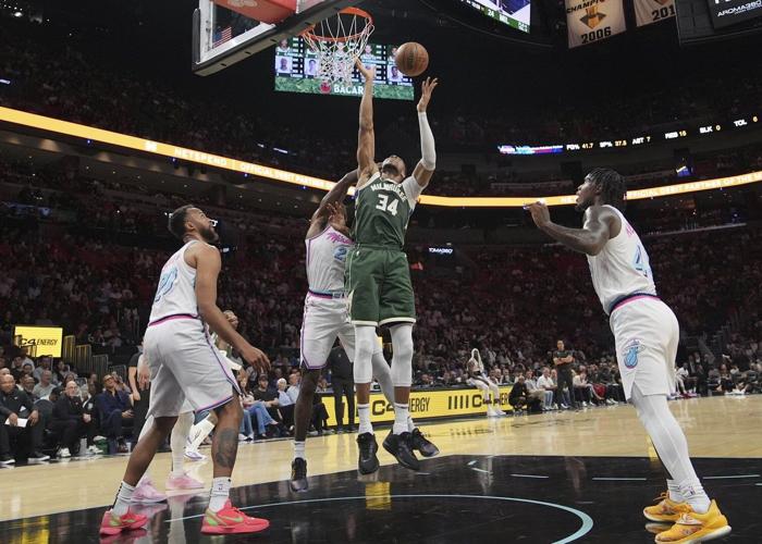 Antetokounmpo's 2nd straight triple-double lifts Bucks over Heat in OT, 121-115