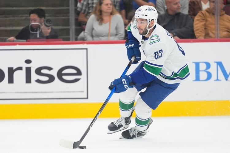 Boeser scores in 4th round of shootout to lift Canucks to 3-2 win over Blackhawks