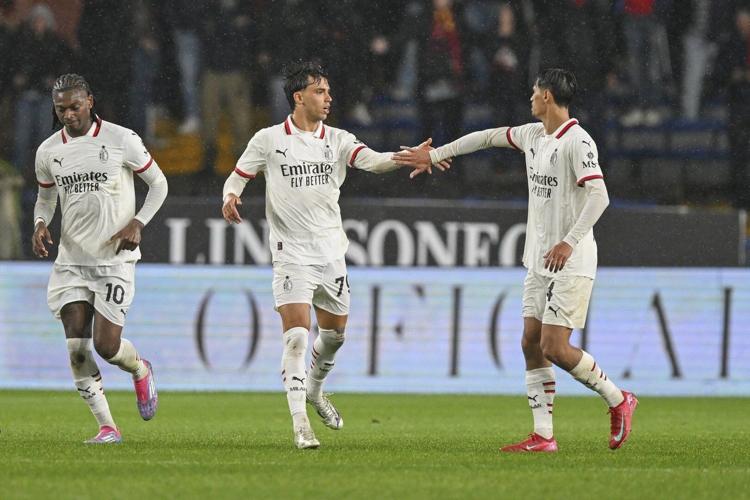 Milan strikes twice in two minutes to beat Genoa and keep alive ...