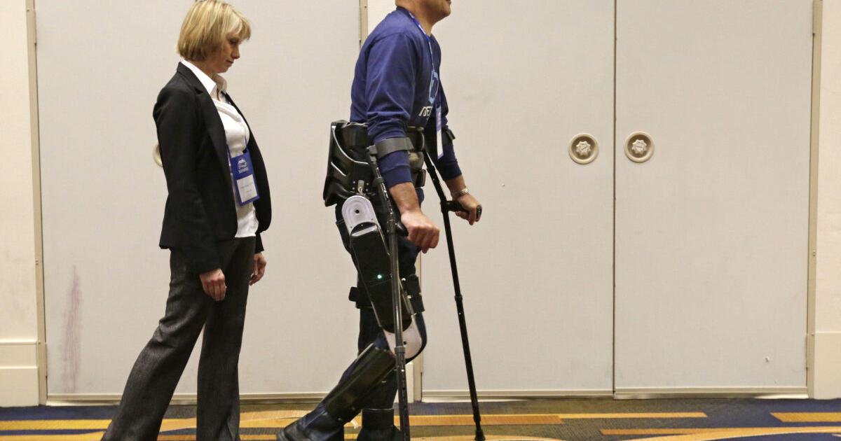 Wearable robots that help paralyzed people walk are getting lighter and ...