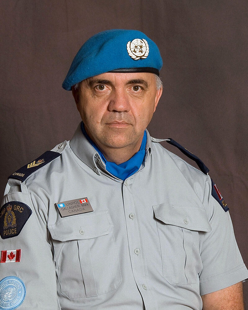 Mountie found dead in rubble