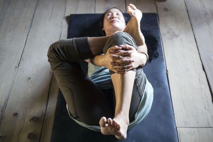 Try the Thread the Needle yoga pose to open up your hips