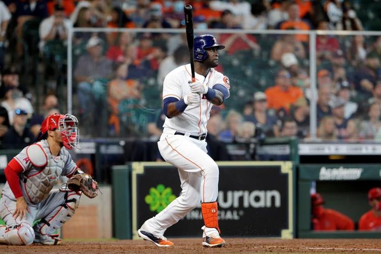 Emanuel goes 8 2/3 in relief in MLB debut, Astros bop Angels