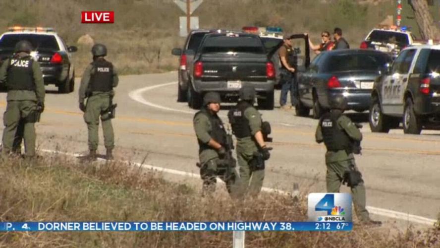 Fugitive ex-cop Christopher Dorner in gun battle, one deputy is killed