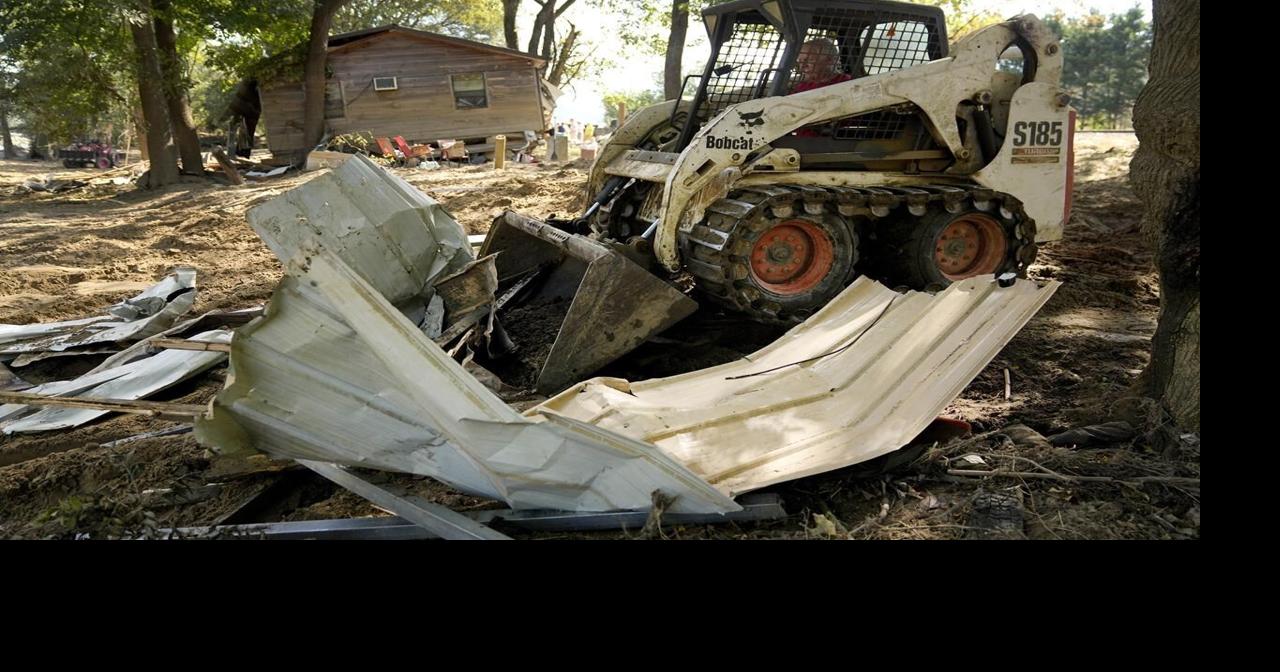 Death toll from Hurricane Helene rises to 227 as grim task of ...