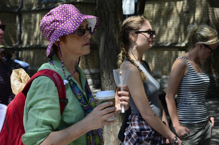 Strangers gather to mourn homeless man shot by police