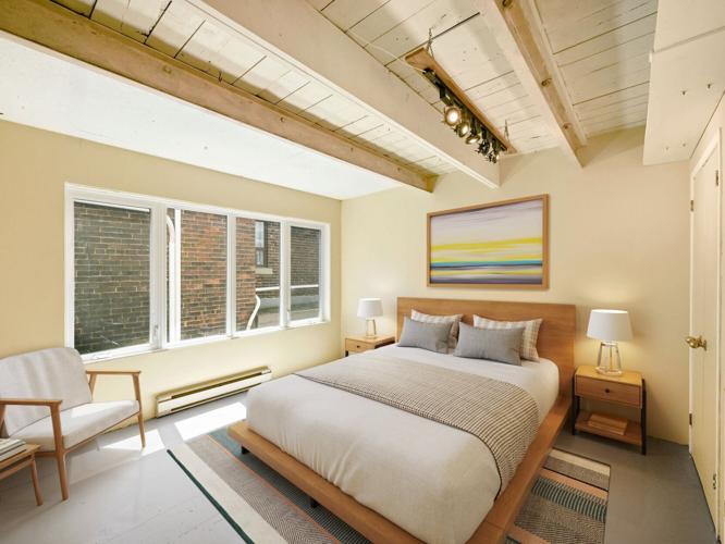 Inside this $980K ‘true hard loft’ townhouse in Toronto