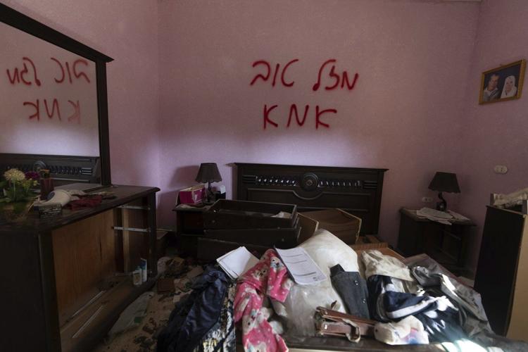 AP PHOTOS: Graffiti left by Israeli soldiers turn south Lebanon homes ...