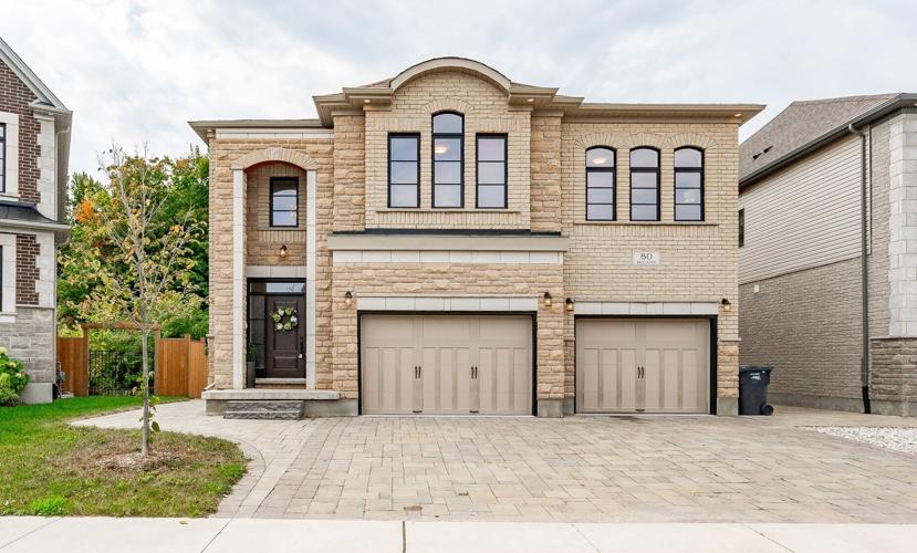 Roomy home in Guelph or custom-built house in Etobicoke?