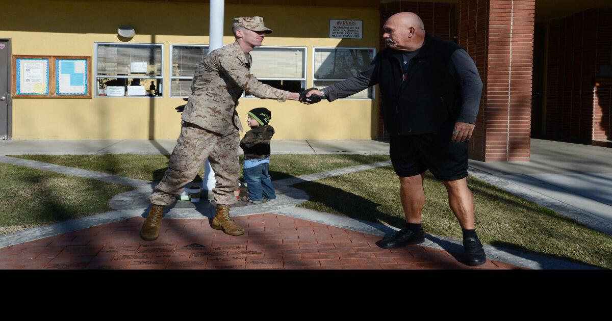 ‘Iraqi war vet’ who stood guard at school asked to leave after lying about his record