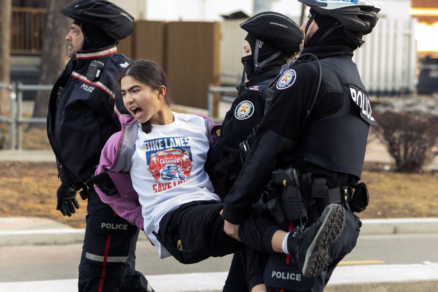Two fined after protest over Toronto bike lanes removal
