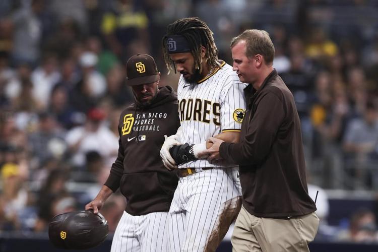 Padres star Fernando Tatis Jr. hurt on slide, leaves game
