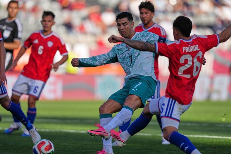 Portugal's Leão sent off for punching in World Cup warmup win over Chile