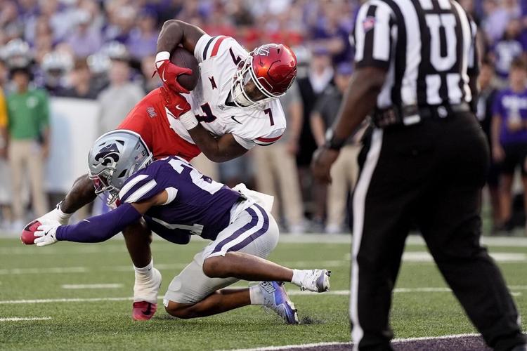 Avery Johnson helps No. 14 K-State dump No. 20 Arizona 31-7 in nonconference matchup of Big 12 foes