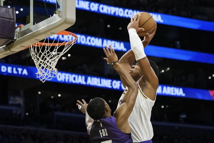 LeBron James records triple-double, Davis scores 31 in Lakers' 131-127 ...