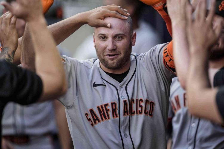 Rafael Devers starts at first base and helps Giants beat Braves 9-0 to ...