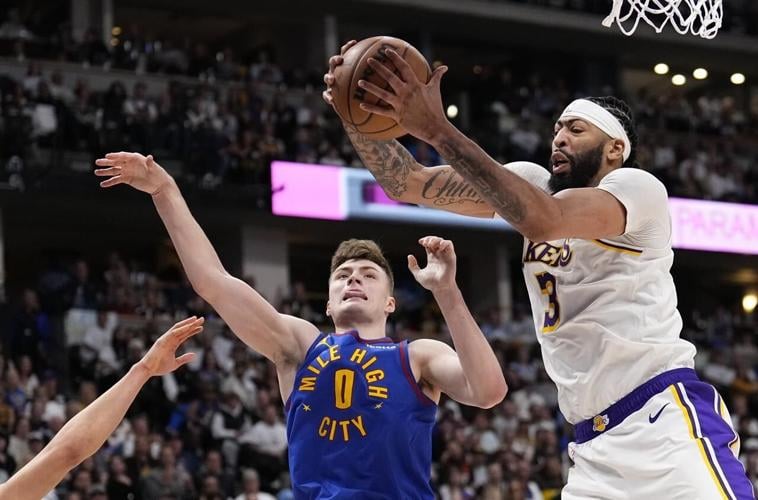 Nikola Jokic leads NBA champ Denver Nuggets past LeBron James and Lakers 114-103 in playoff opener