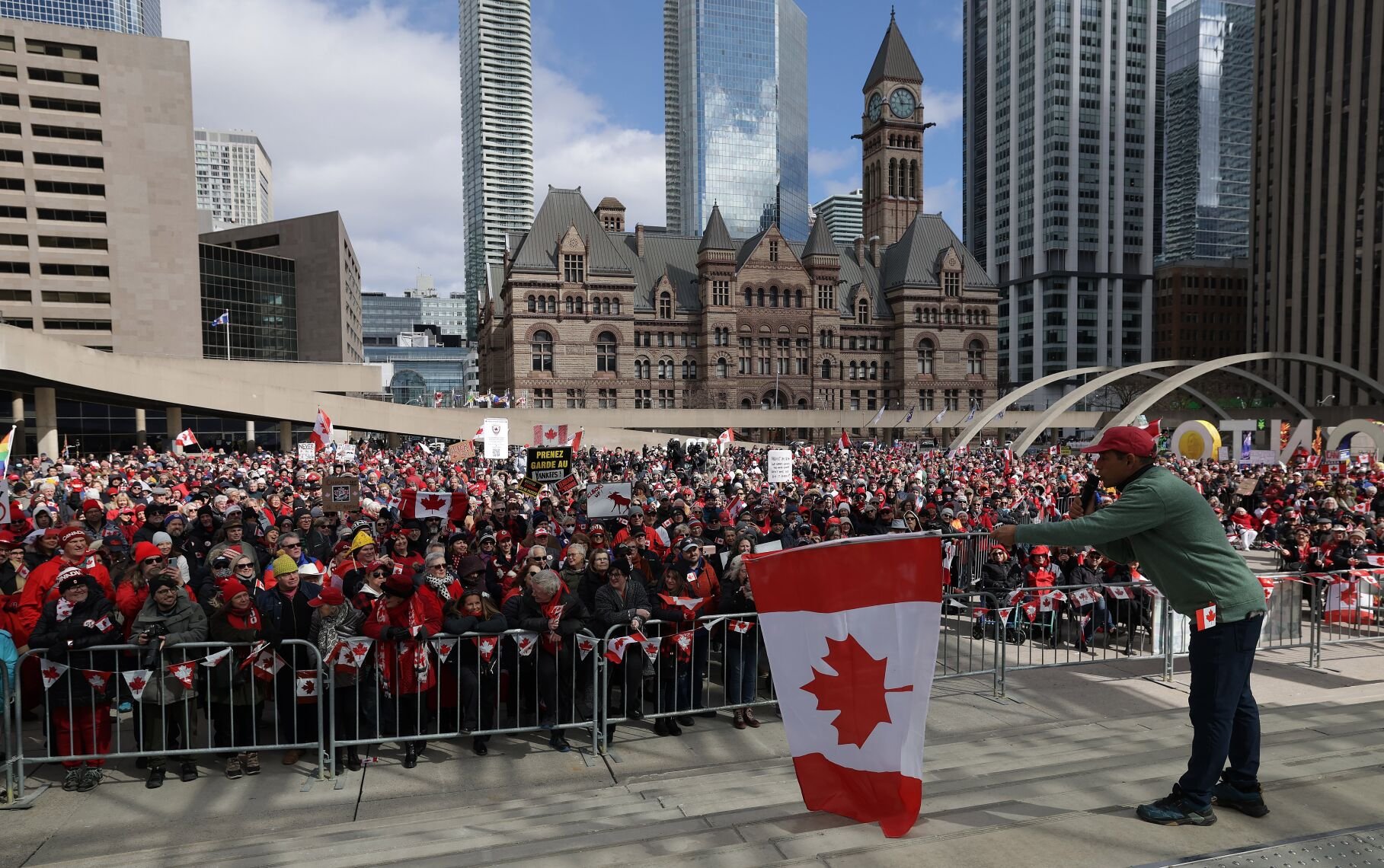 Elbows were up in Toronto as hundreds rally against Trump