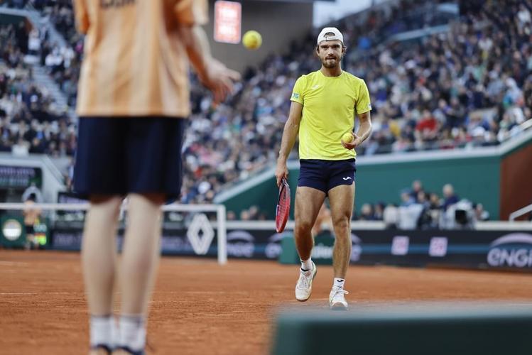 On a wing and a prayer, a pigeon is rescued by a French Open chair ...