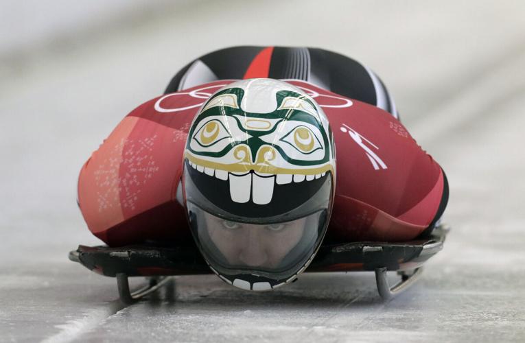Olympic skeleton competitors show personality in their helmets