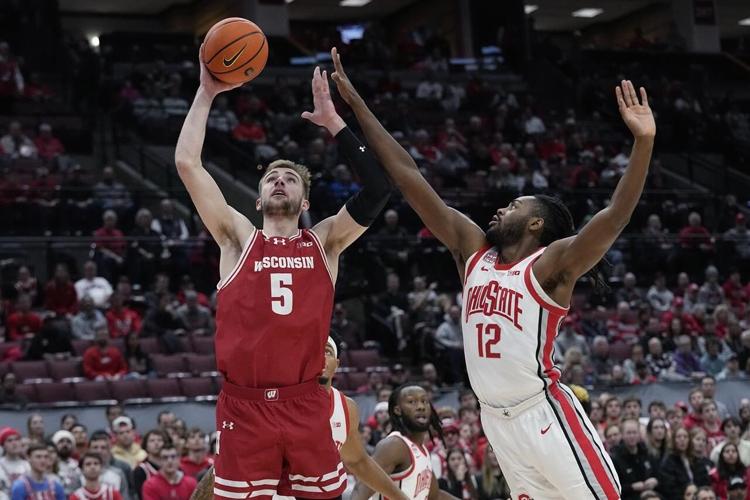 Klesmit scores 18 in the second half to rally No. 15 Wisconsin to a 71 ...