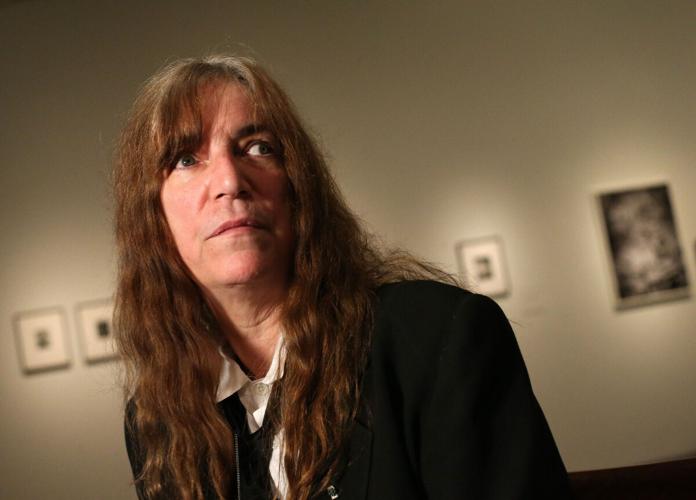 Patti Smith exchanges a smile with Pope Francis at the Vatican