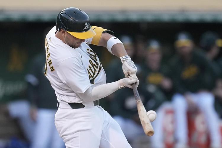 Hogan Harris and 3 Athletics relievers combine to blank Astros 4-0