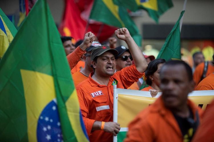 Brazil oil workers clash with Petrobras in 18-day strike