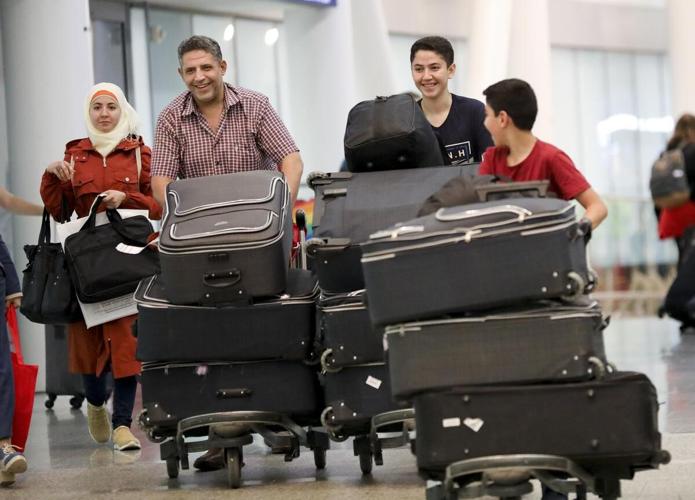 ‘It feels like a dream’: Syrian refugee family in tearful reunion at ...