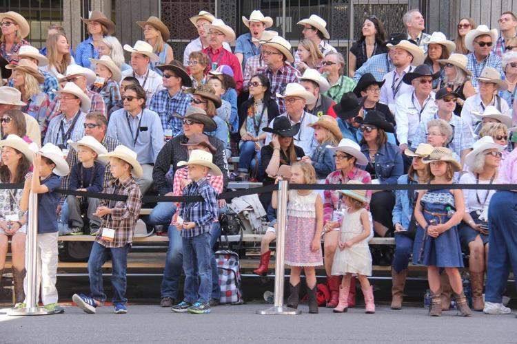 Couple says ‘I do’ before hitching a special ride in the Stampede parade