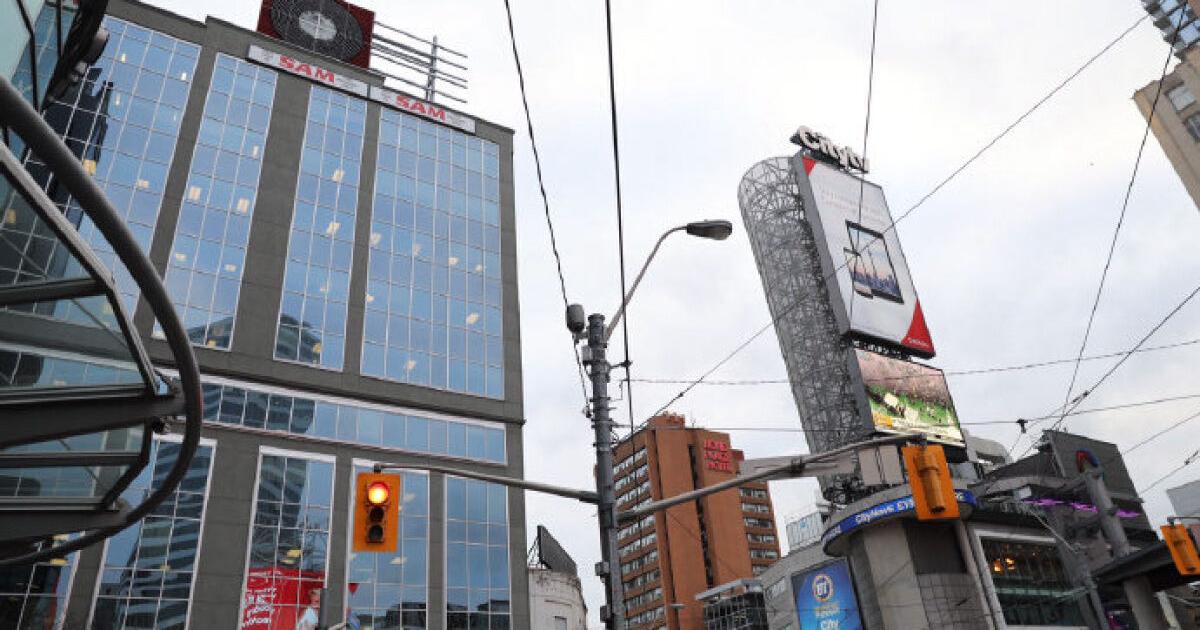 Sam the Record Man sign back at Yonge-Dundas Square