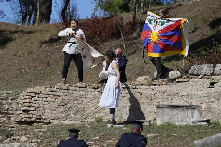 Torch and sandals: What to know about the flame-lighting ceremony in ...